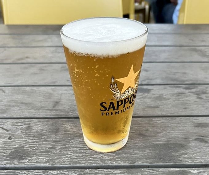 Nothing complements a burger adventure like a crisp Sapporo, its golden effervescence cutting through rich flavors like a samurai sword through butter.