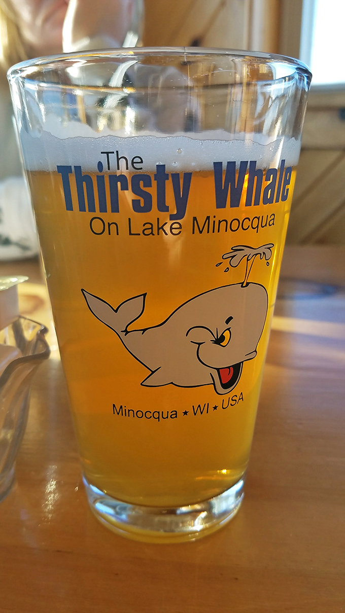A frosty beer in a glass that tells you exactly where you are &ndash; because vacation calories don't count when they're consumed with a view of the water.
