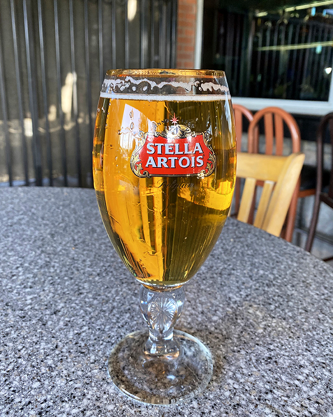 Nothing says "California casual" quite like a perfectly chilled Stella Artois catching afternoon light on granite.