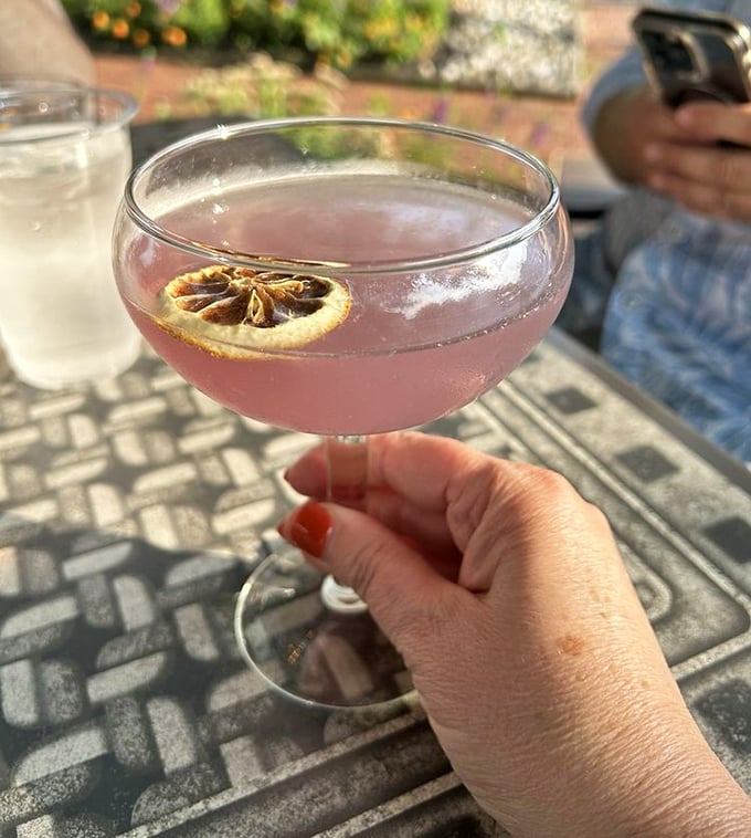 A cocktail that's dressed better than most people at the party. That dried citrus garnish isn't just for show&mdash;it's the exclamation point on a perfect sentence. 