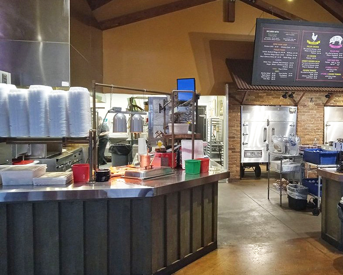 Behind every great barbecue is a kitchen that means business. No fancy marble countertops, just the serious hardware of smoke and fire.