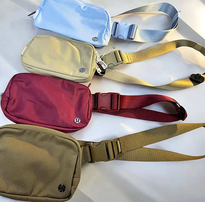 Lululemon belt bags lined up like fashionable soldiers. The rainbow of options makes choosing just one the day's biggest challenge.