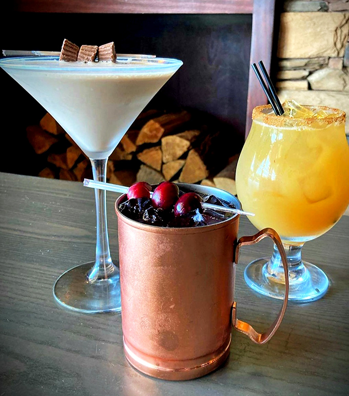 Liquid artistry in three acts: a dessert-inspired martini, a Moscow Mule with plump cherries, and a sunshine-yellow cocktail rimmed with promise.
