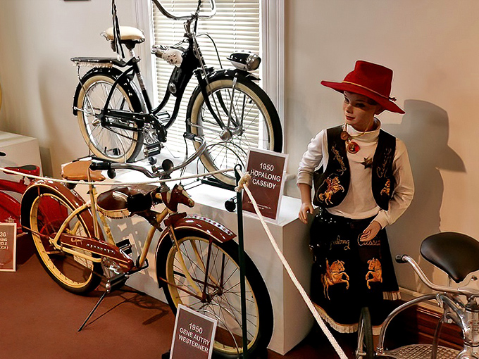 The 1950 Hopalong Cassidy bike sits beside its cowboy companion. When your bicycle needed to match your Saturday morning TV hero.