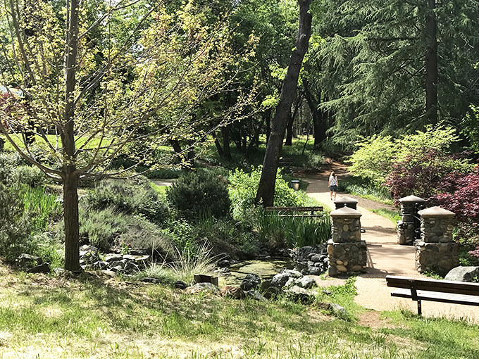 Bille Park's stone entryway welcomes visitors to paths winding through native plantings. Nature's version of a luxury spa entrance.