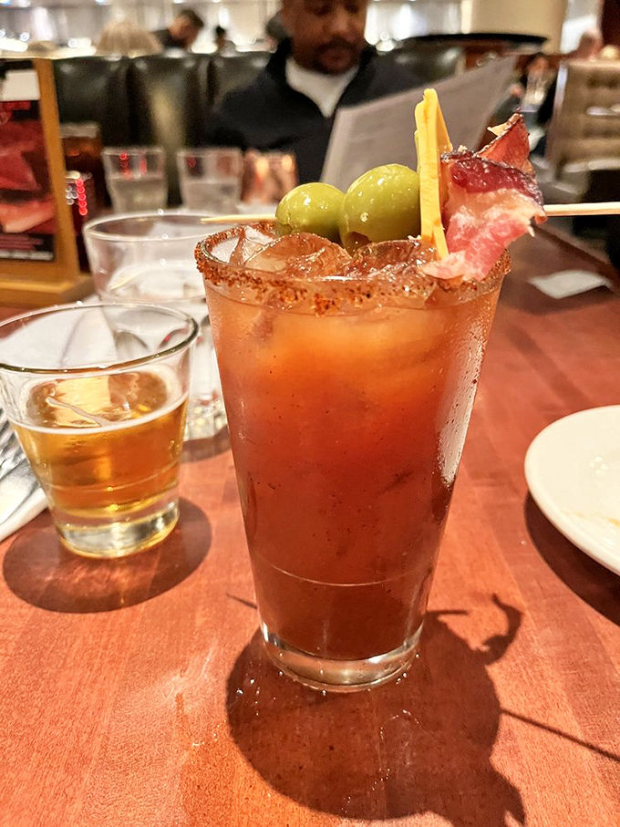 Not your average Bloody Mary&mdash;this spice-rimmed masterpiece comes armed with olives, bacon, and enough personality to be considered a dining companion.