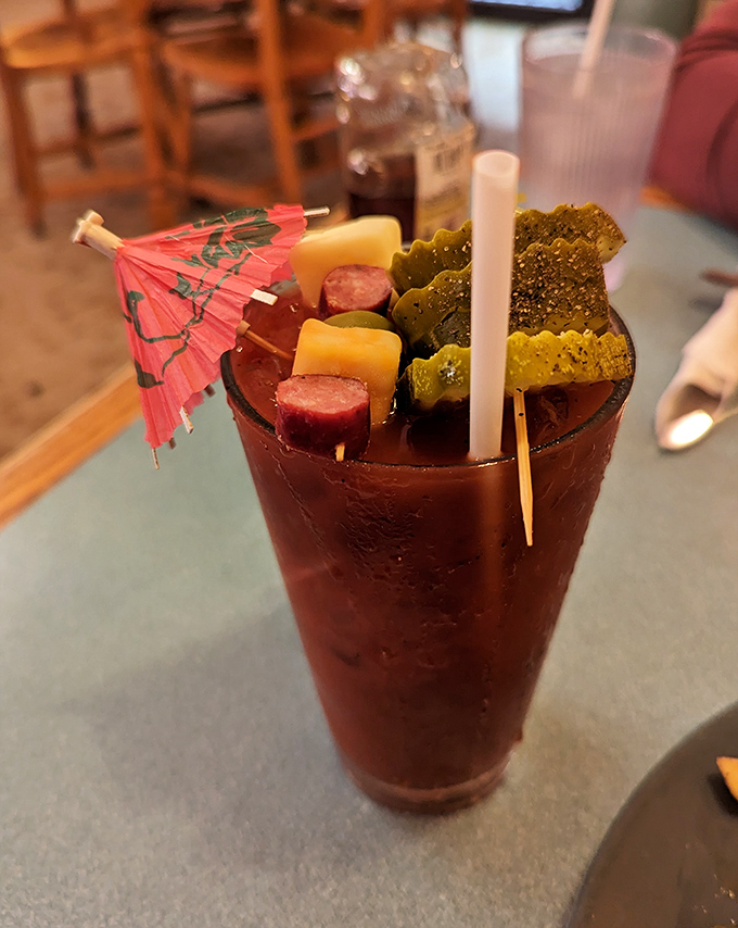 This Bloody Mary comes dressed to impress, complete with pickle spear and cocktail umbrella theatrics.