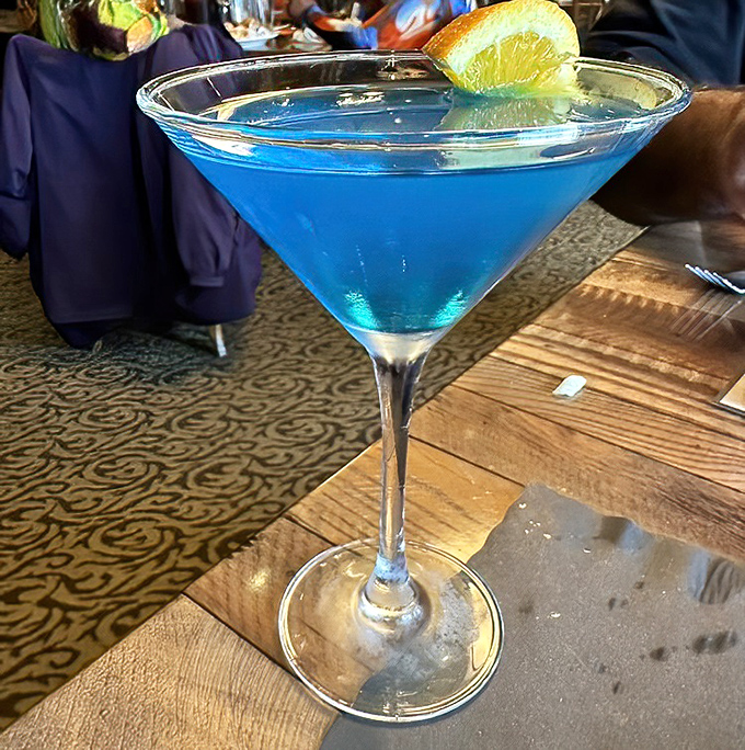 The Blue Ball Cosmopolitan &ndash; electric blue and dangerously sippable. Like the ocean in a glass, minus the sand in uncomfortable places. 