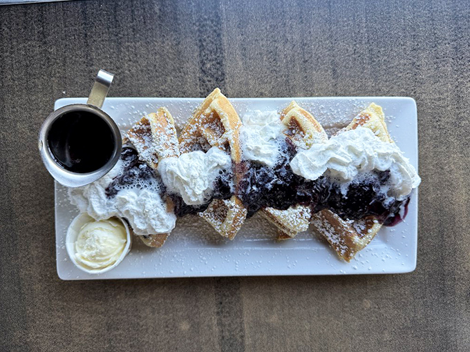 Blueberry waffles with whipped cream&mdash;because sometimes breakfast should double as dessert. No regrets here.