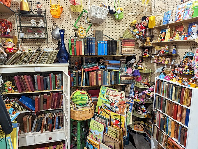 Literary treasures and childhood companions await new homes in this cozy corner where vintage books share space with the stuffed friends of generations past.