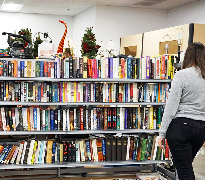 Literary treasures stack up between festive decorations, proving that between these shelves, both stories and seasons find new homes.