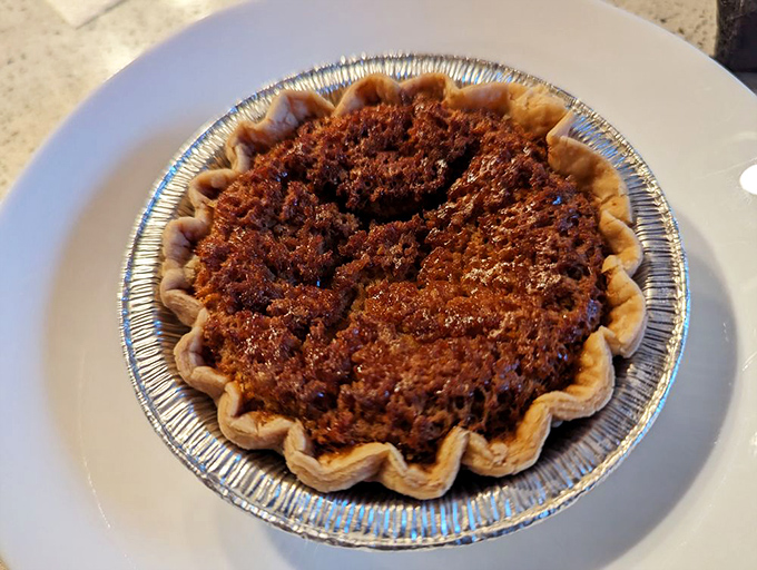 Bourbon buttermilk pie: where Southern comfort food meets dessert in a relationship that makes you wonder why you'd ever waste calories on anything else.