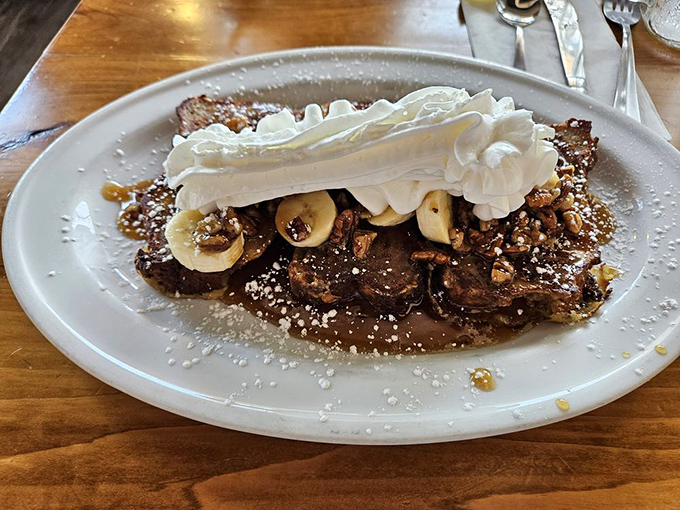 Bread pudding that makes you question why anyone bothers with other desserts. Those bananas and whipped cream aren't just toppings&mdash;they're co-stars.