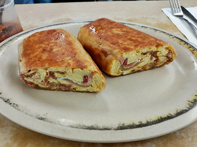 This breakfast burrito wraps morning perfection in a tortilla, delivering eggs, bacon, and pure satisfaction in every bite.