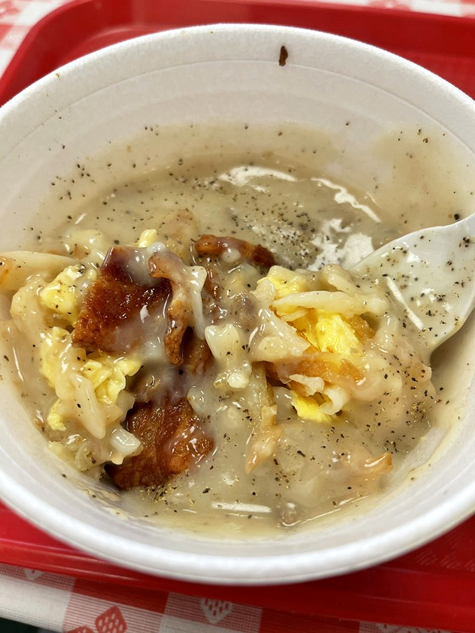 Breakfast in a bowl: eggs, bacon, and whatever else the kitchen decided you needed today&mdash;a morning symphony of comfort.