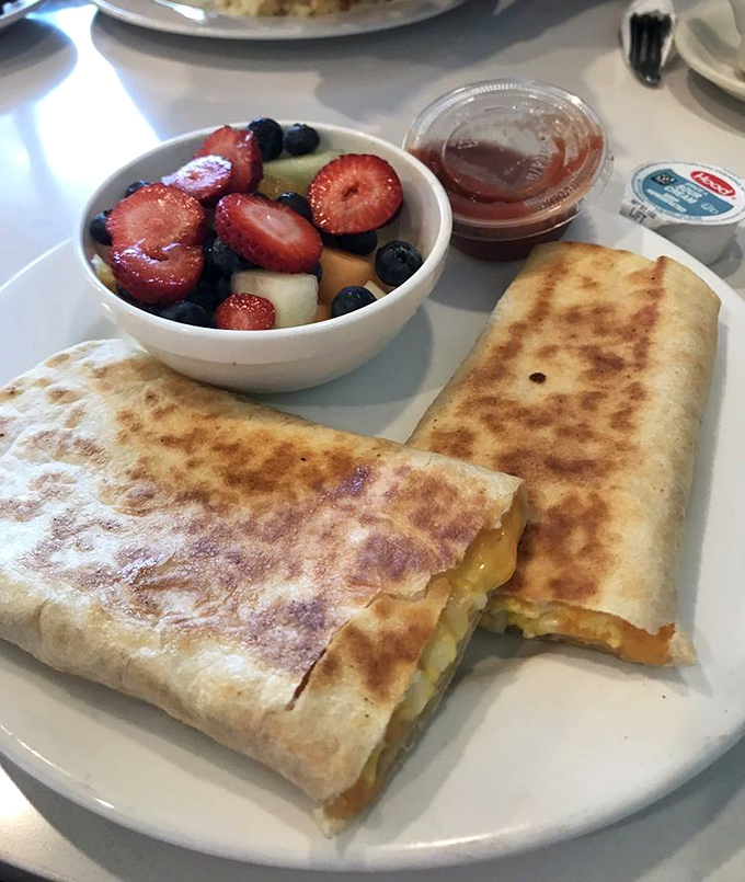 Breakfast burritos and fresh fruit—proof that morning meals can be both virtuous and indulgent in the same delicious sitting.