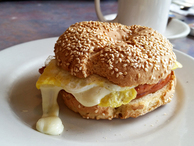 Breakfast sandwich architecture at its finest&mdash;the melty cheese dripping just so, the sesame bagel providing the perfect foundation.