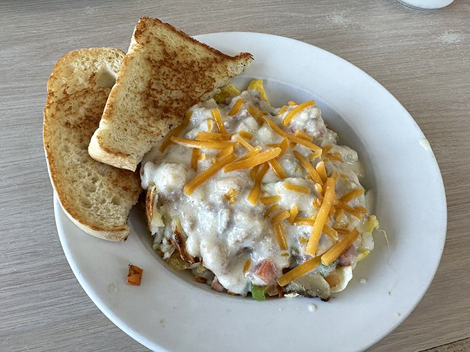 This breakfast skillet isn't just a meal&mdash;it's a commitment to excellence, with cheese melting into every nook and cranny of morning perfection.