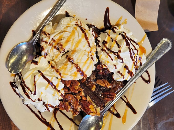 A brownie sundae that makes you understand why people invented spoons in the first place. Caramel, chocolate, and ice cream performing a three-part harmony.