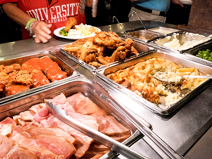 The buffet line: where good intentions about portion control go to die. That fried chicken is worth every extra minute on the treadmill tomorrow.