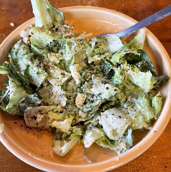 A Caesar salad that actually deserves attention &ndash; fresh, crisp romaine with just the right amount of dressing. Even vegetables deserve respect.