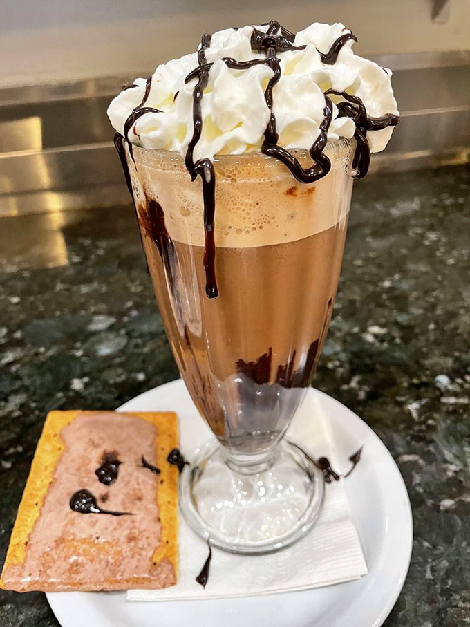 This isn't just a mocha&mdash;it's dessert masquerading as coffee, topped with enough whipped cream to make your cardiologist wince delightfully.