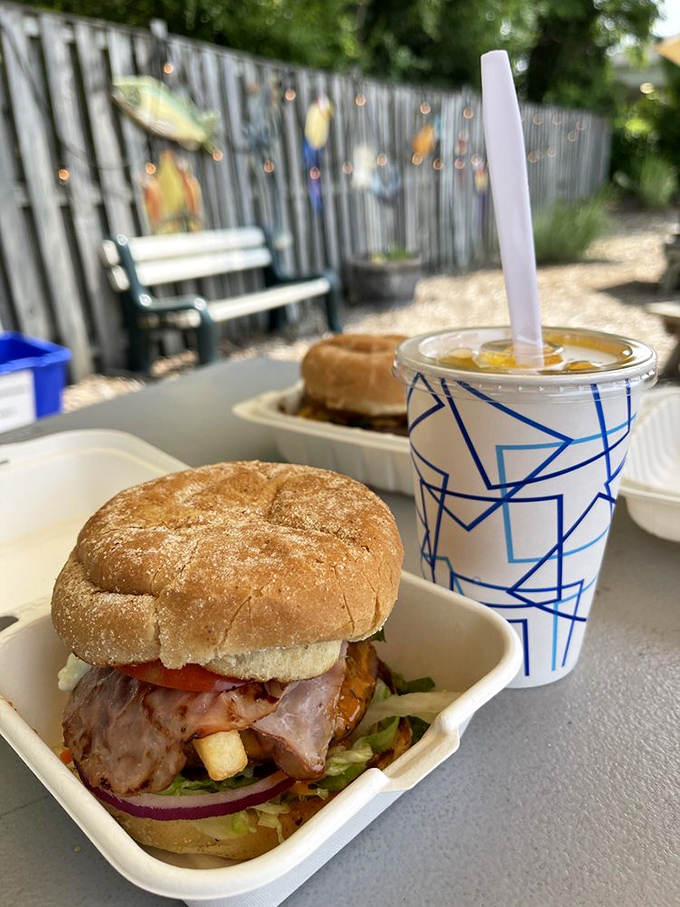 Al fresco dining with a side of paradise &ndash; burgers always taste better when enjoyed with a gentle breeze.