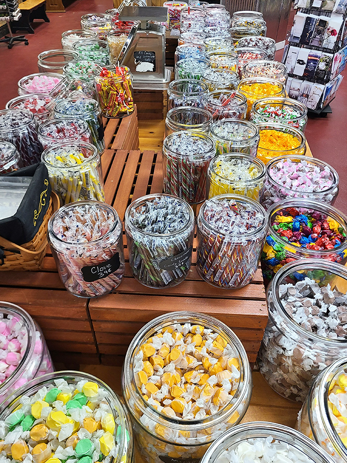 A candy lover's dream landscape: dozens of glass jars filled with colorful treats. Self-control, we hardly knew ye.
