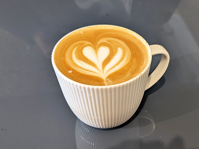 Coffee art so pretty you almost feel guilty disturbing it. Almost. The perfect companion to whatever breakfast indulgence you've chosen.