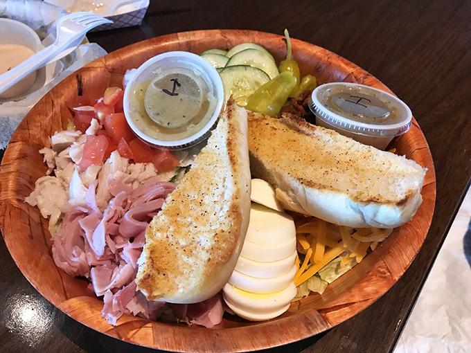 This isn't just a salad plate; it's a deconstructed sandwich party where all the ingredients are mingling before the main event.