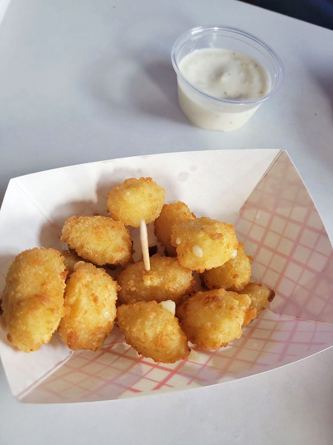 Cheese balls that crunch like childhood memories. One bite and suddenly you're wondering why you ever bothered with fondue.