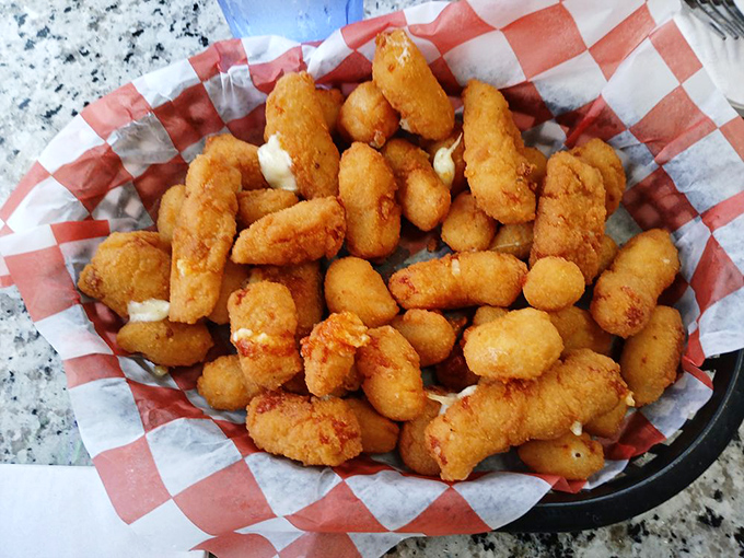 Bite-sized golden nuggets that make you question why you don't eat fried cheese more often. The perfect sidekick to your seafood adventure.