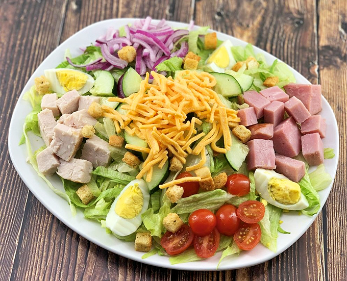 A chef salad that doesn't apologize for being generous. When vegetables get dressed up for their big night out on the town.