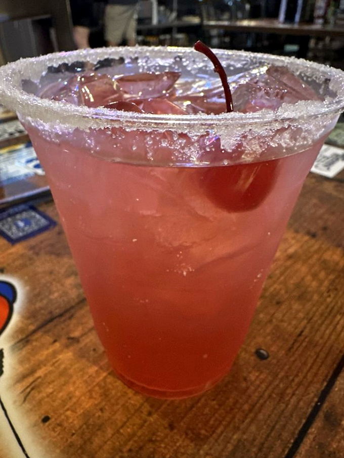 One sip of this cherry-hued cocktail and you'll understand why some drinks deserve their own fan club.