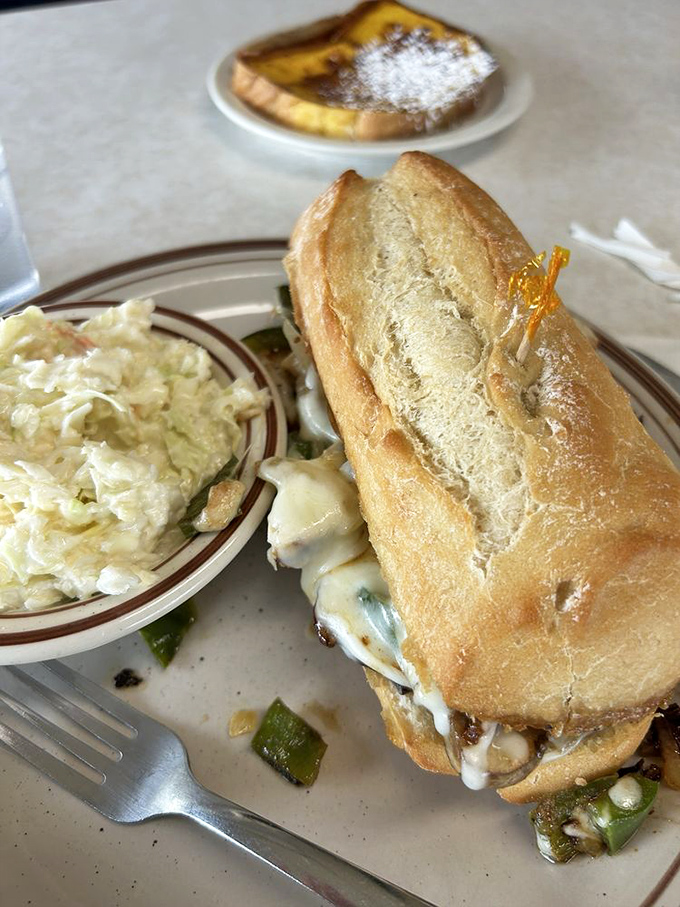 This chicken philly proves that great sandwiches can bridge any regional rivalry with melted cheese diplomacy.