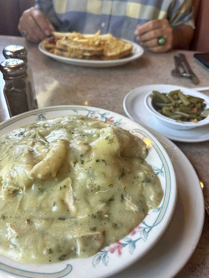 Chicken and dumplings swimming in gravy so rich it could buy a yacht. This isn't just comfort food&mdash;it's therapy.