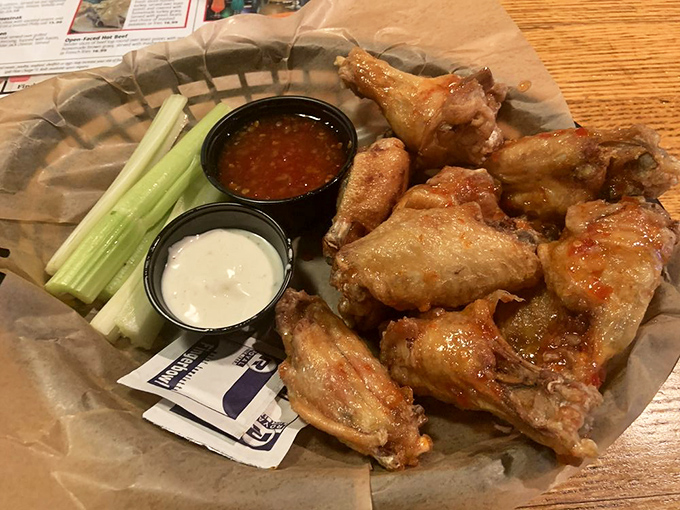 These wings aren't trying to fly under the radar&mdash;crispy, saucy, and served with cooling dips and celery, they're the perfect tavern companion.