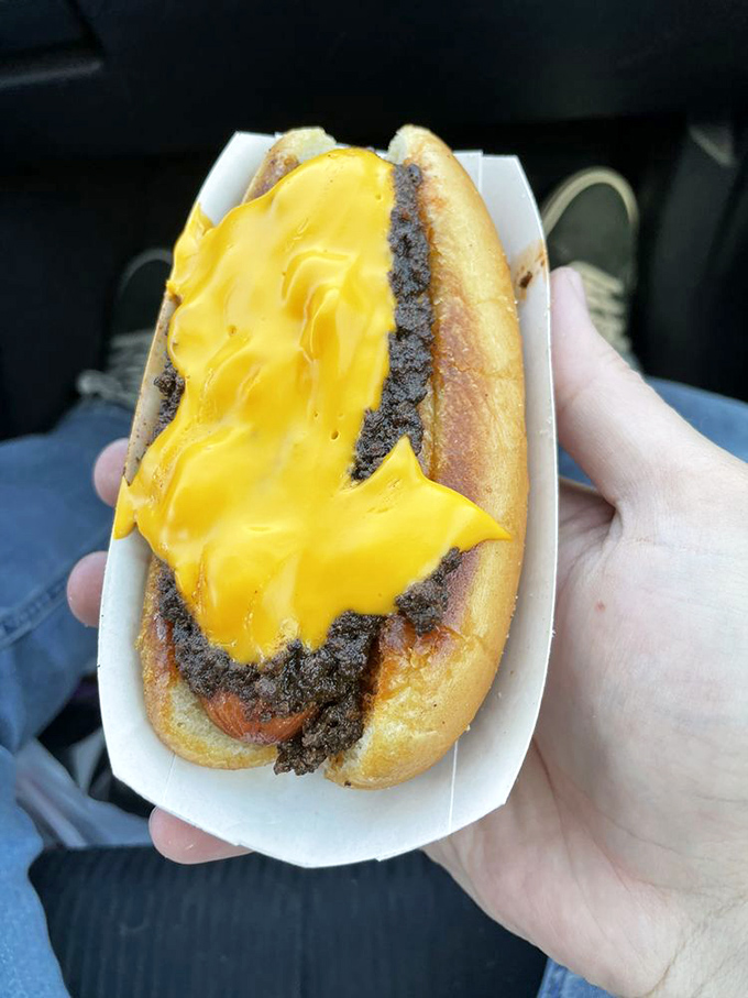 The chili dog, served car-side&mdash;where melted cheese meets savory chili in a handheld masterpiece that's worth the inevitable shirt stain.