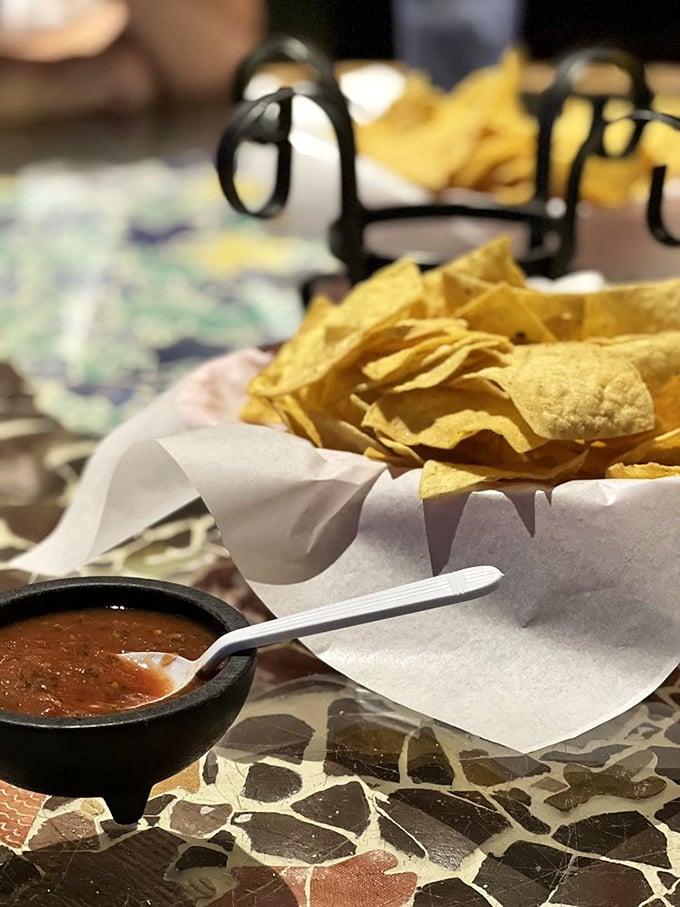 Fresh chips and salsa arrive like old friends, ready to start every meal conversation properly.