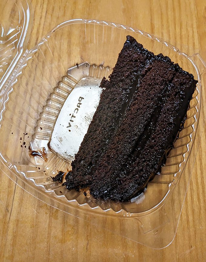 Death by chocolate never looked so appealing. This slice of rich, dark cake is the perfect sweet finale to a savory sandwich symphony.