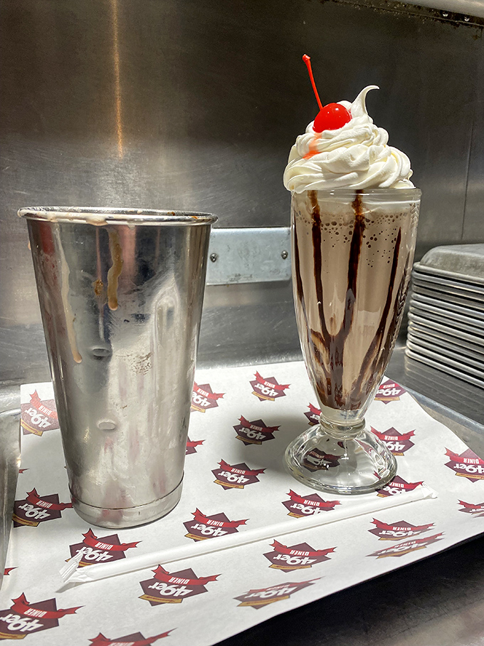 The milkshake that requires bicep strength to sip and willpower to share. That metal mixing cup on the side? That's what we call a bonus round.