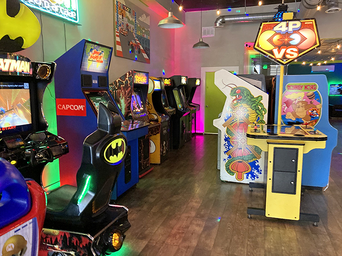 Batman, racing games, and fighting cabinets line up like old friends at a reunion. They've aged better than most of us.