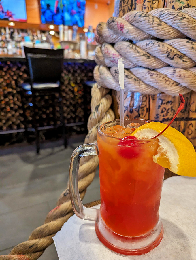 The perfect seafood sidekick: a sunset-colored cocktail that promises refreshment between bouts of shell-cracking warfare. That cherry is just showing off. 