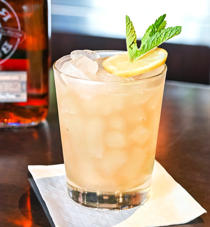 A cocktail that says "I'm sophisticated enough to appreciate good spirits but fun enough to enjoy a mint garnish" &ndash; summer in a glass.