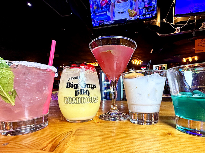 Cocktails lined up like colorful soldiers ready for duty. That yellow one in the middle? It's about to become your new best friend.