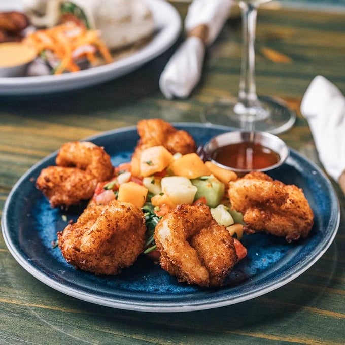 These coconut shrimp have the perfect crunch-to-juicy ratio, like tiny flavor bombs waiting to detonate on your taste buds.