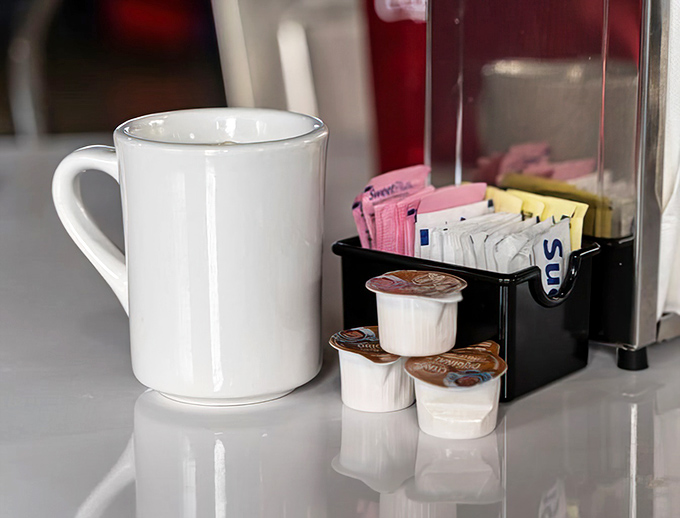 Fresh coffee served in classic mugs because some traditions never go out of style or taste.