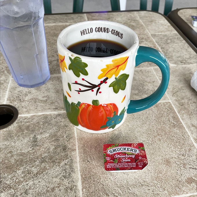 A festive seasonal mug filled with the elixir of morning motivation. Coffee this honest deserves respect&mdash;and maybe a second cup.