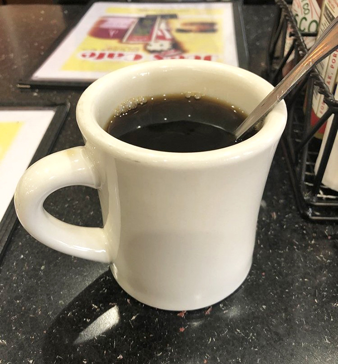 The humble diner coffee mug&mdash;unassuming vessel of liquid ambition, conversation starter, and the most essential tool for navigating mornings since time immemorial.