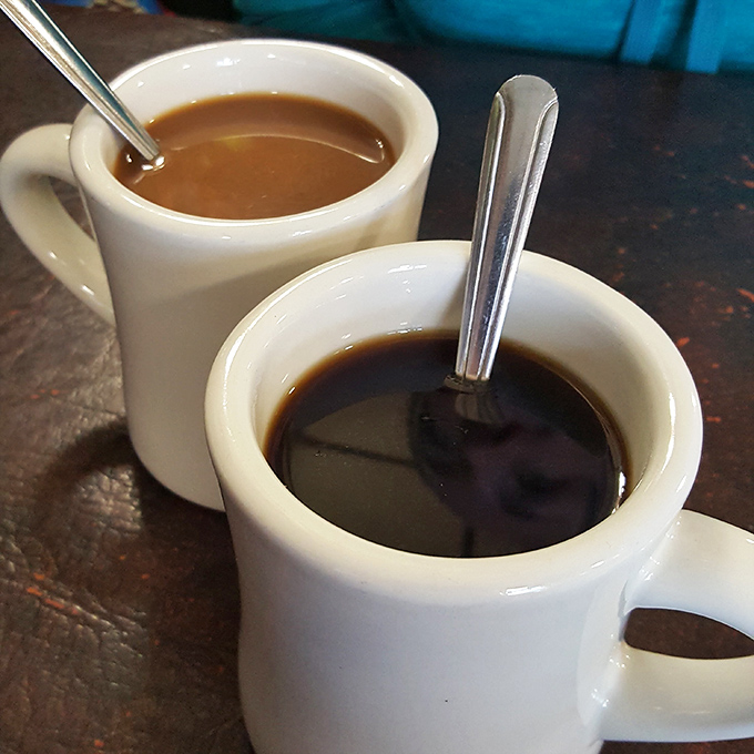 Diner coffee in those thick white mugs&mdash;not fancy, not pretentious, just honest brew that knows its job is to wake you up.